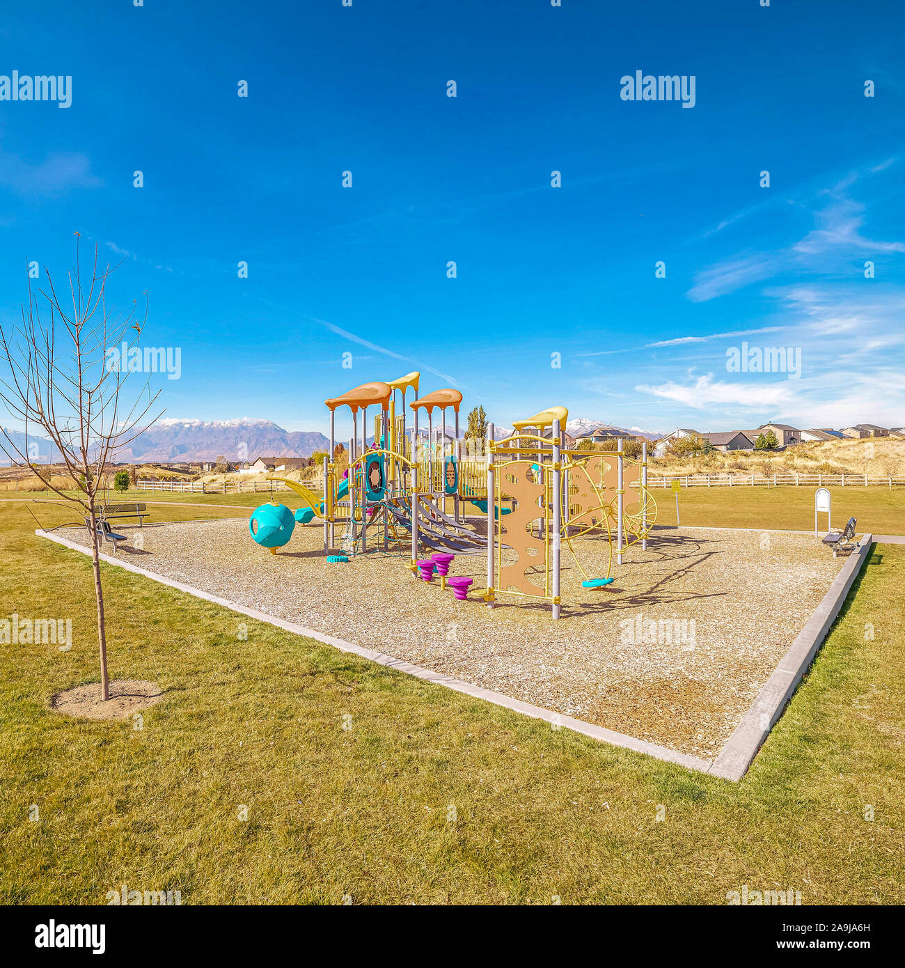 Square Corner perspective of a small kids playground Stock Photo - Alamy