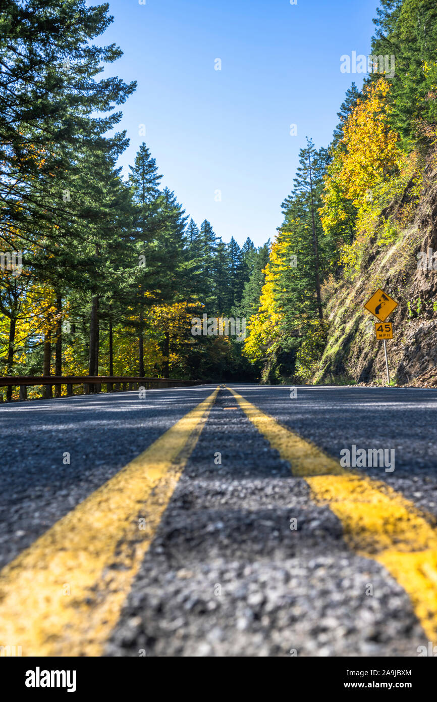 A mesmerizing landscape that attracts tourists with a winding road with ...