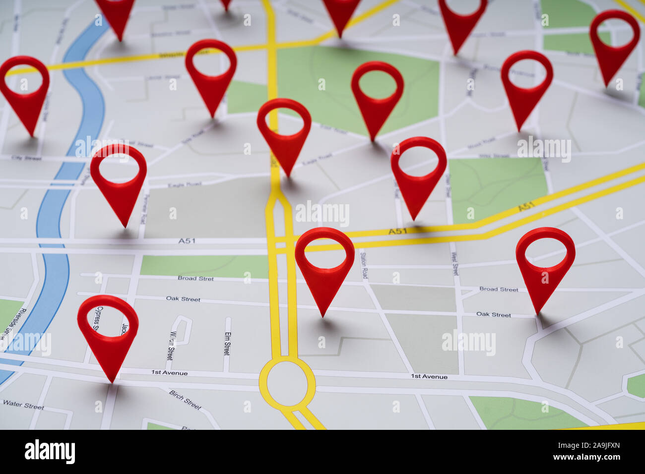 Close-up Of A Road Map With Red Navigation Icons Stock Photo - Alamy