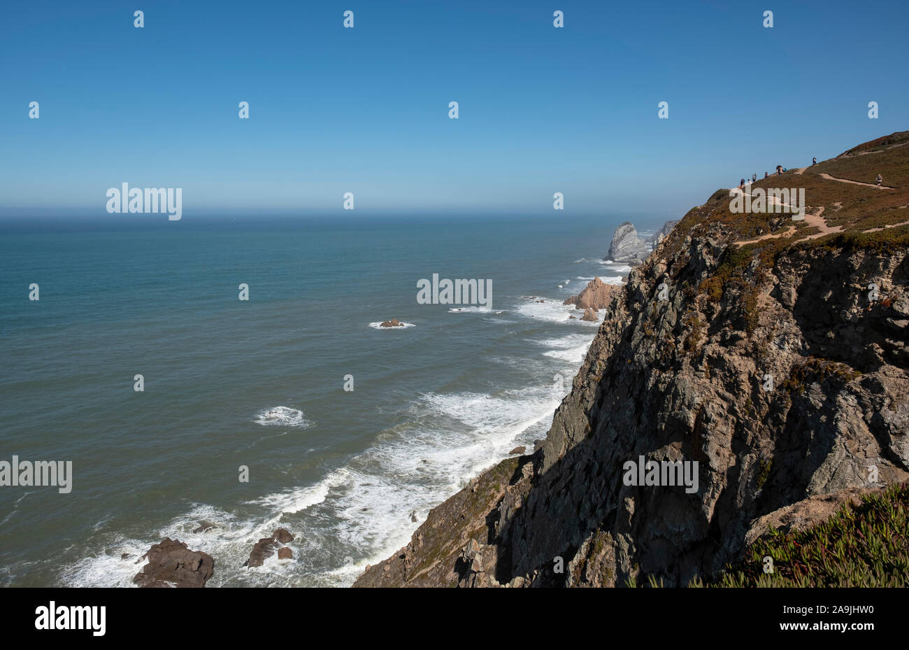 Th panoramic view from the rugged coast and granite cliffs of Cabo da ...
