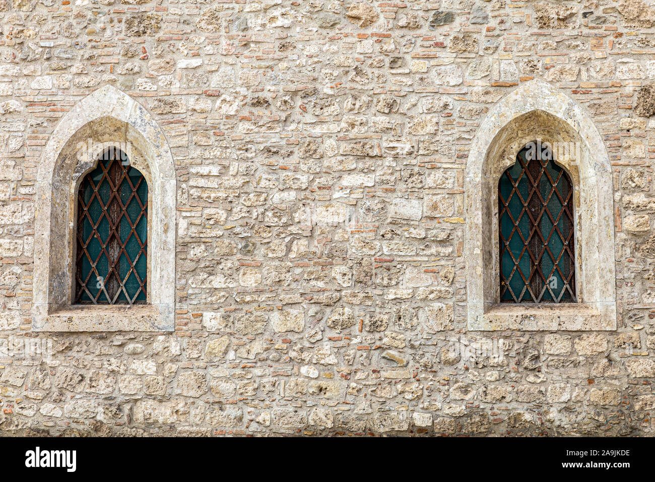 windows in the facades of ancient medieval houses Stock Photo - Alamy