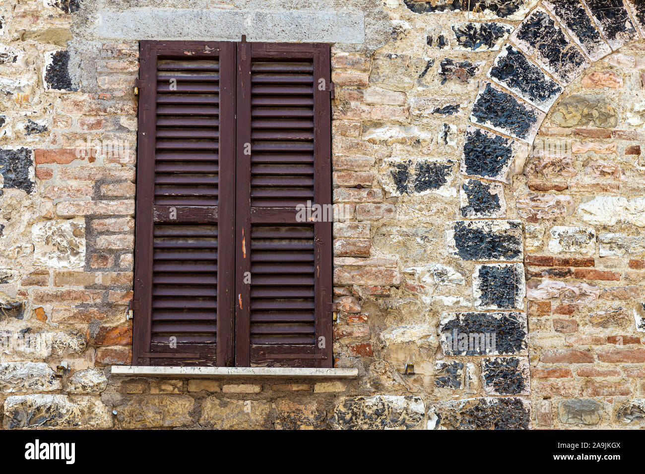 windows in the facades of ancient medieval houses Stock Photo - Alamy