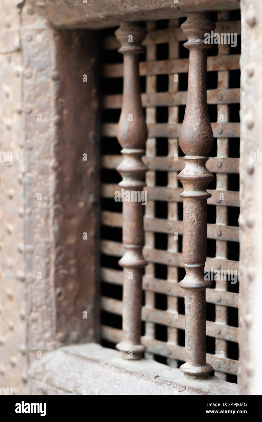 a small barred window in a stone house Stock Photo - Alamy