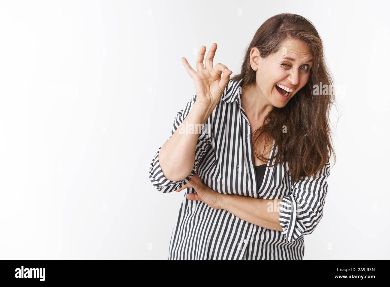 Lady cheeky smile hi-res stock photography and images - Alamy
