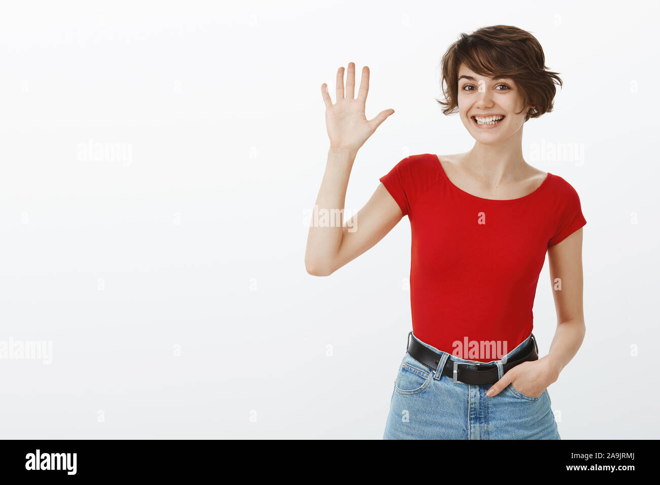 Hello nice to meet you. Cheerful outgoing good-looking girl approaching ...