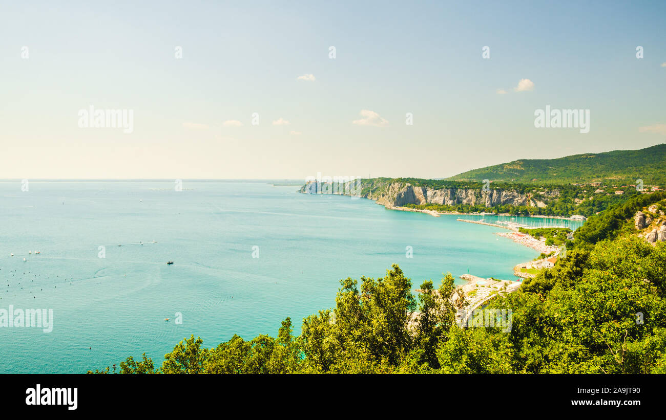 View at Bay with tourist resort in gulf of Trieste near town Sistiana ...