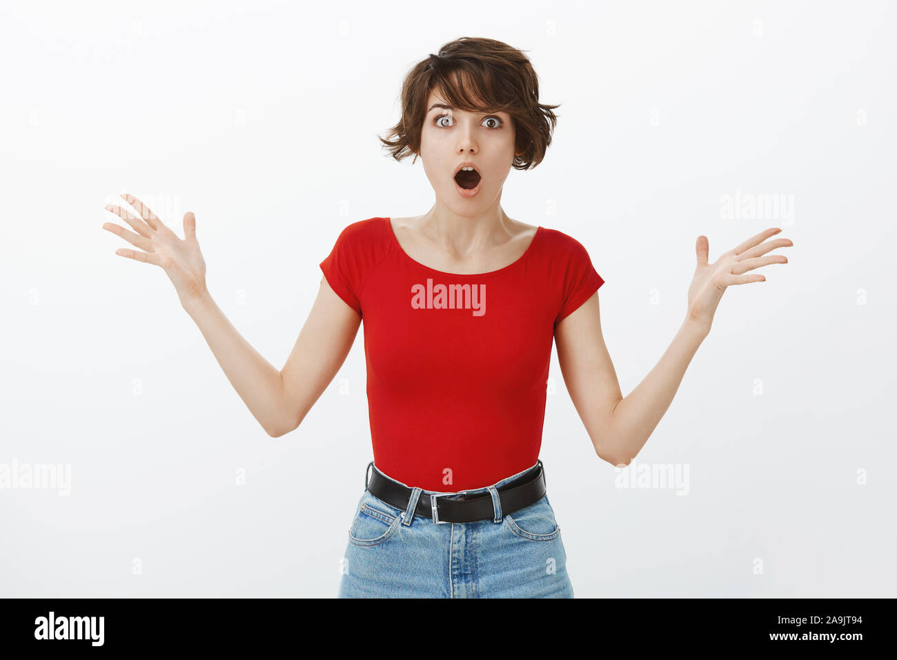 Wondered surprised attractive cute european girl short pixie haircut ...