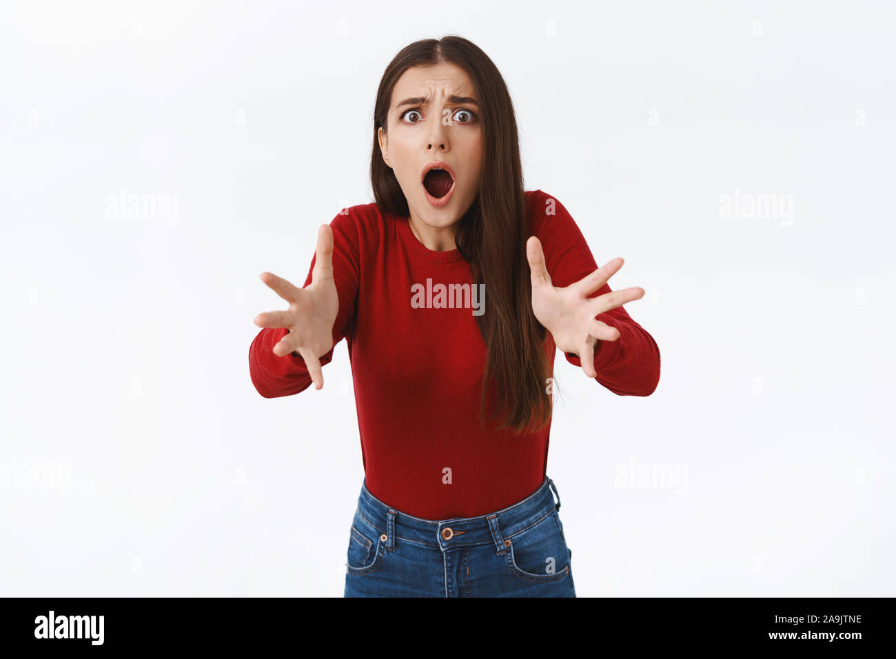 Shocked worried young girl watching someone in danger, gasping scared ...