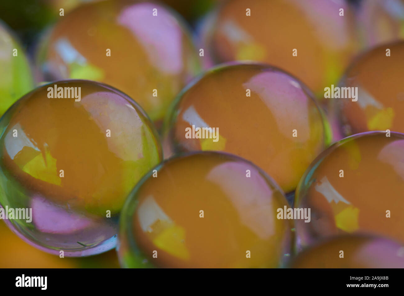 Yellow glass balls close up view. Abstract colorful pattern Stock Photo ...