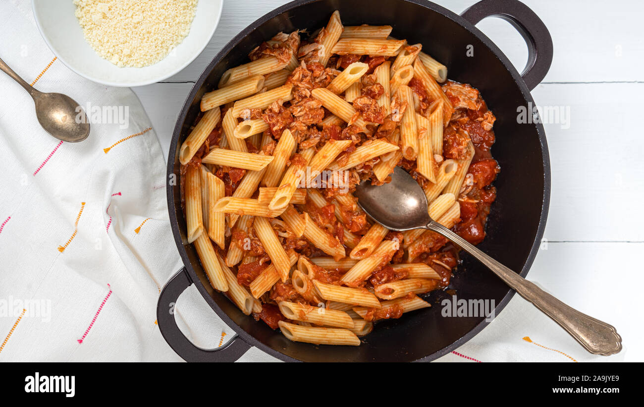 Tomato And Tuna Fish Penne Pasta With Parmesan Stock Photo - Alamy