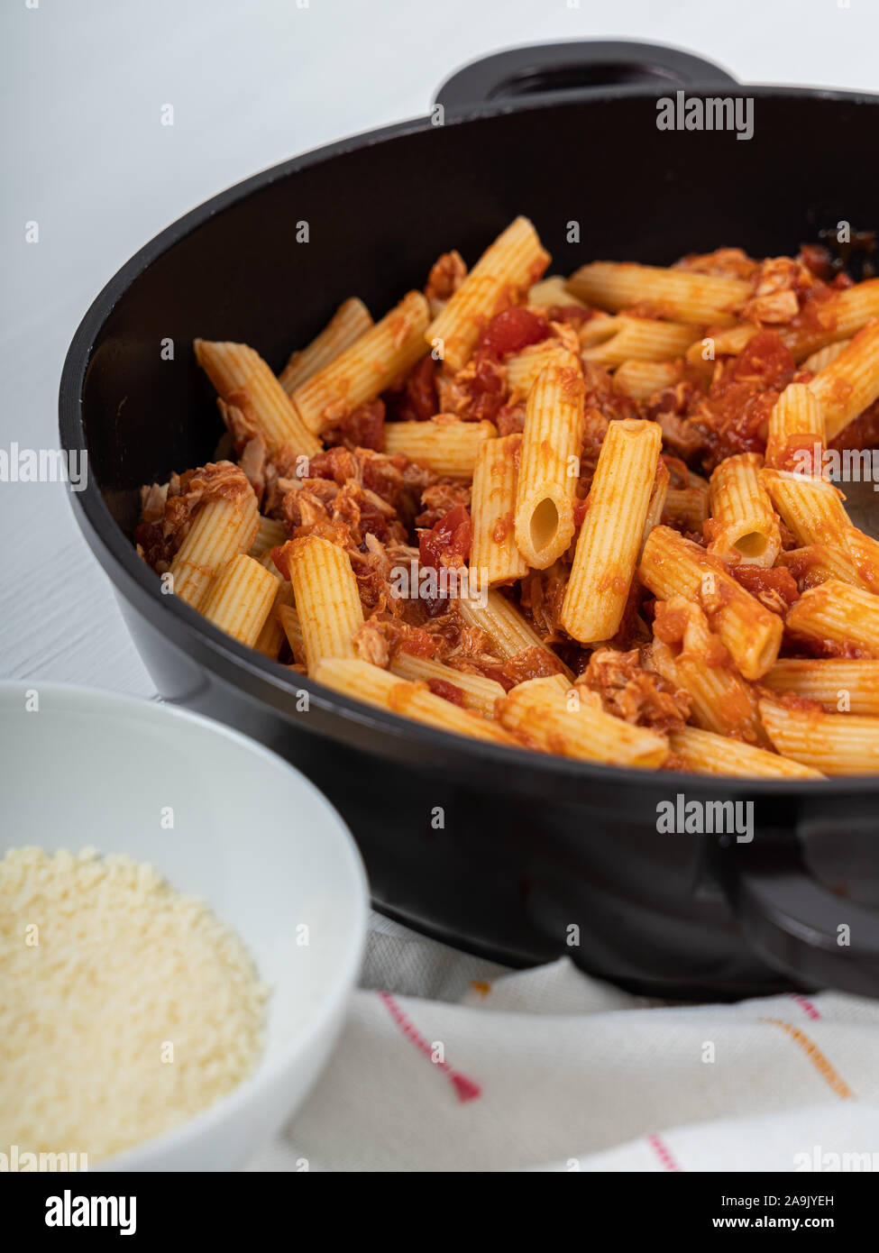Tomato And Tuna Fish Penne Pasta With Parmesan Stock Photo - Alamy