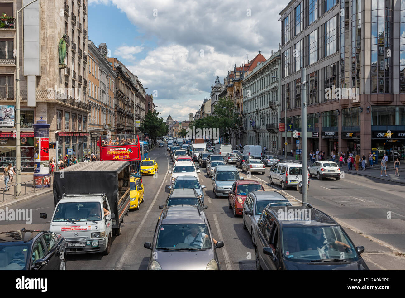 Shopping street downtown Budapest with traffic during rush hour Stock ...