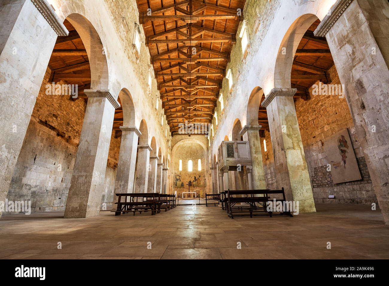 Interior of the central nave of the medieval Abbey of San Liberatore a ...