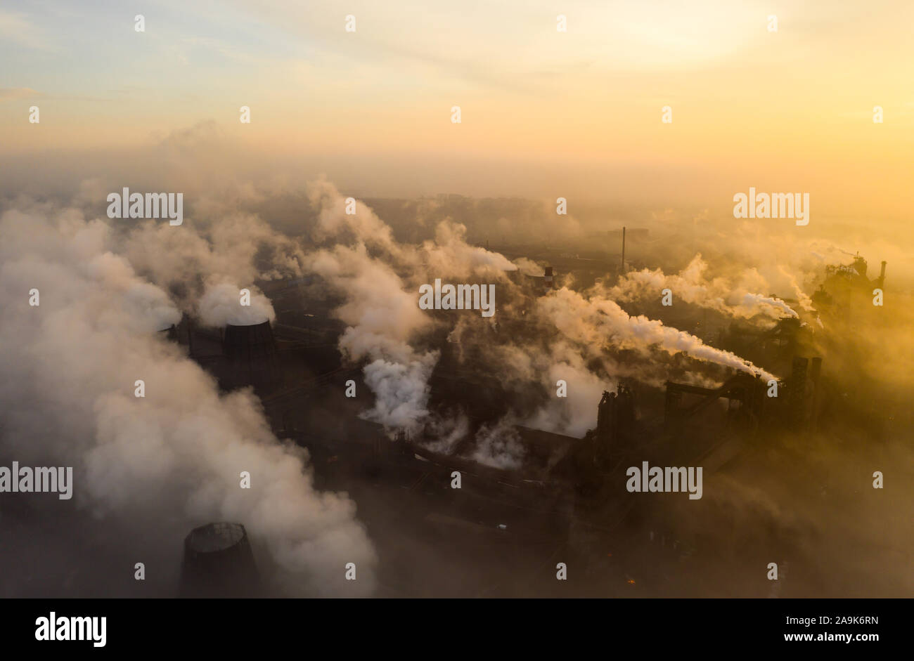 Aerial view. Pipes Throwing Smoke in the Sky Stock Photo - Alamy