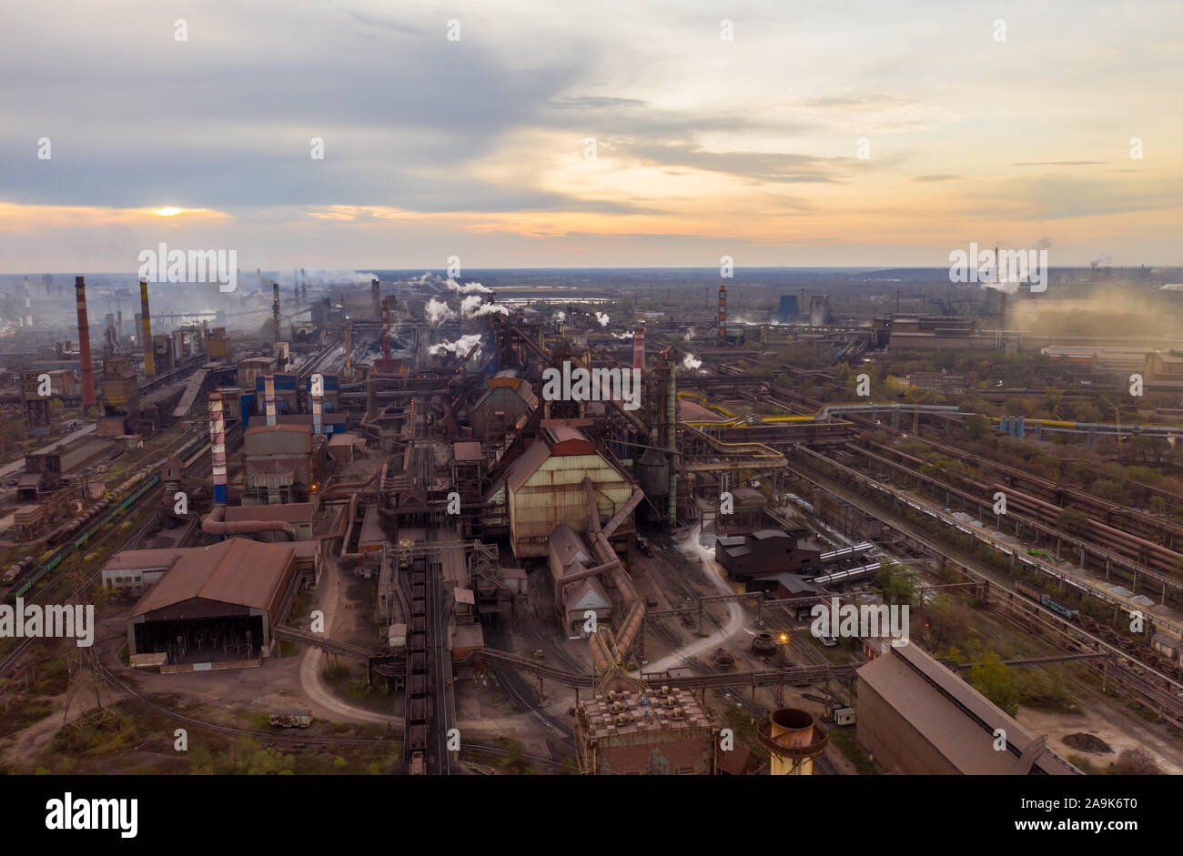 Aerial view. Pipes Throwing Smoke in the Sky Stock Photo - Alamy