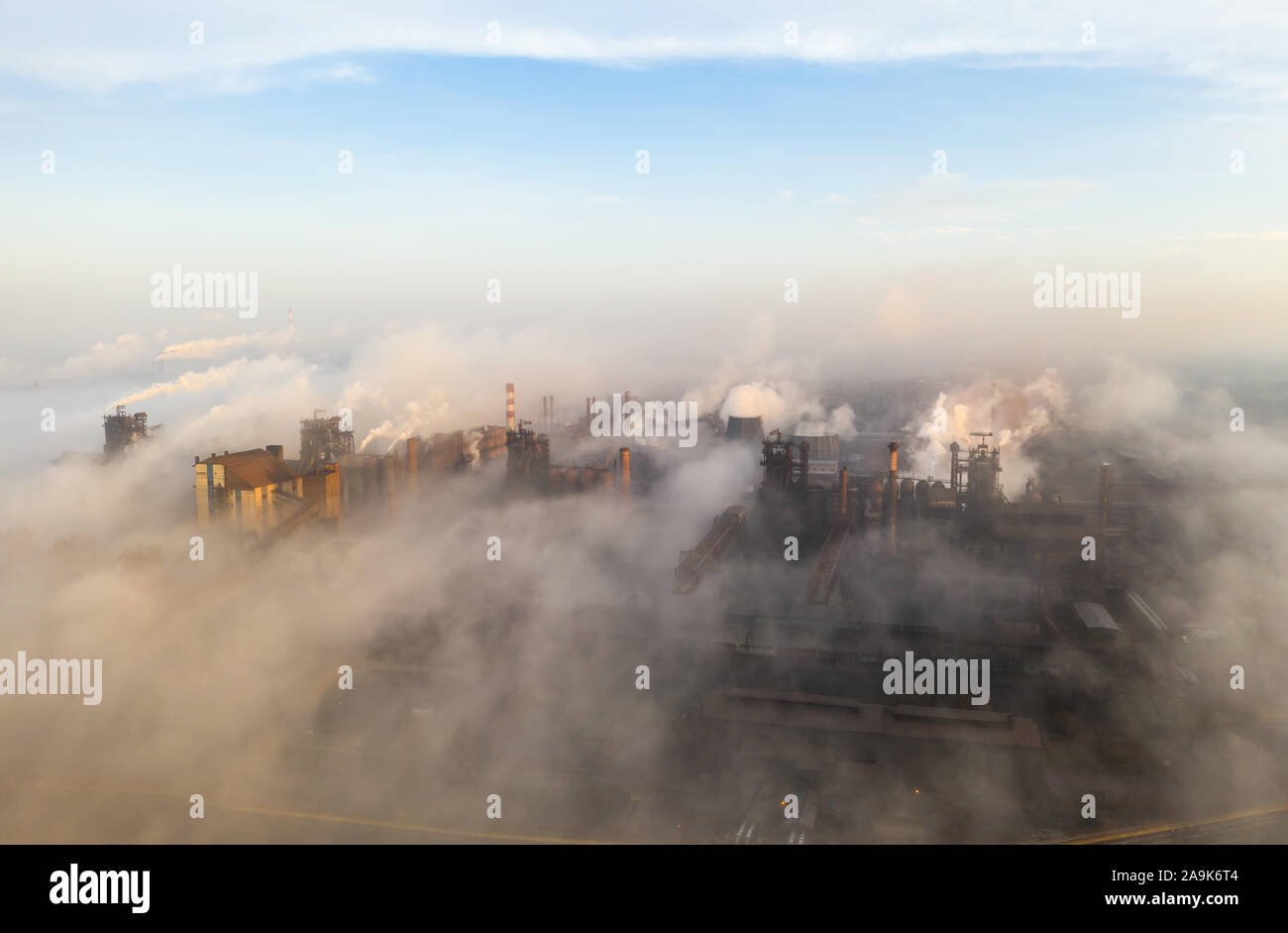 Aerial view. Pipes Throwing Smoke in the Sky Stock Photo - Alamy