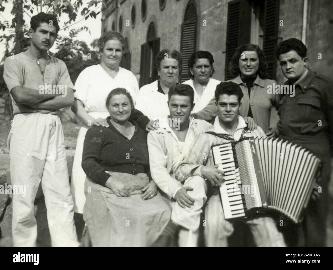 Family group with accordion, Italy Stock Photo - Alamy