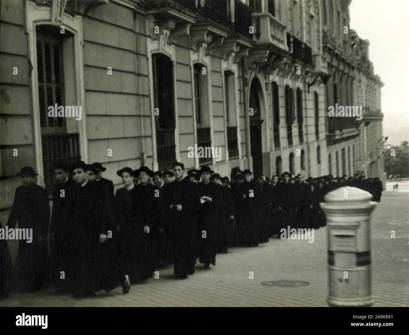 Large group of Catholic priests in the street Stock Photo - Alamy