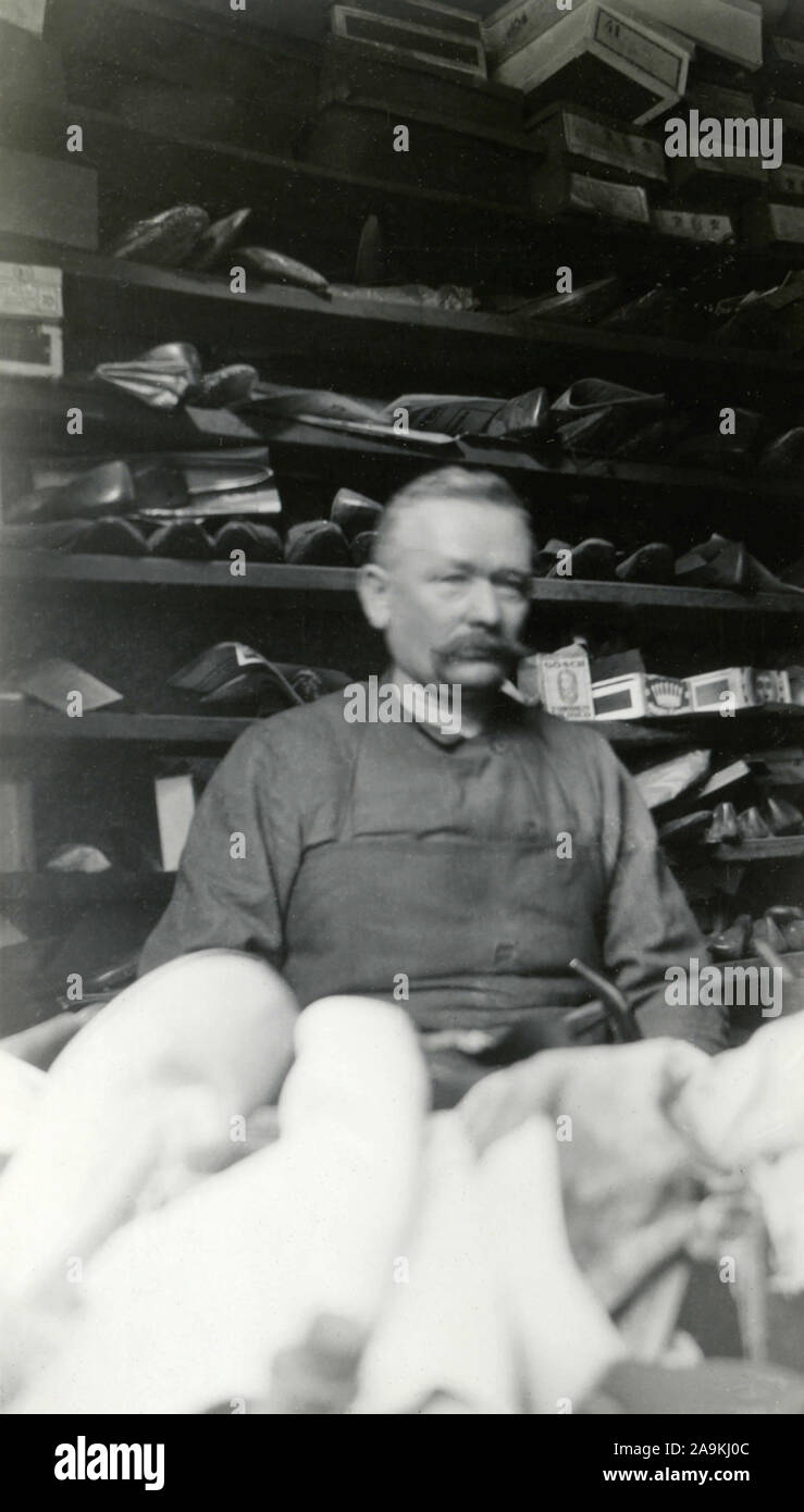 A shoemaker in his shop, Denmark Stock Photo - Alamy