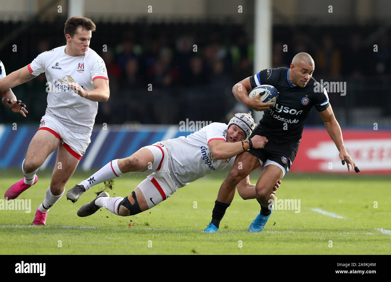 Bath Rugby's Jonathan Joseph is tackled by Ulster's Luke Marshall ...