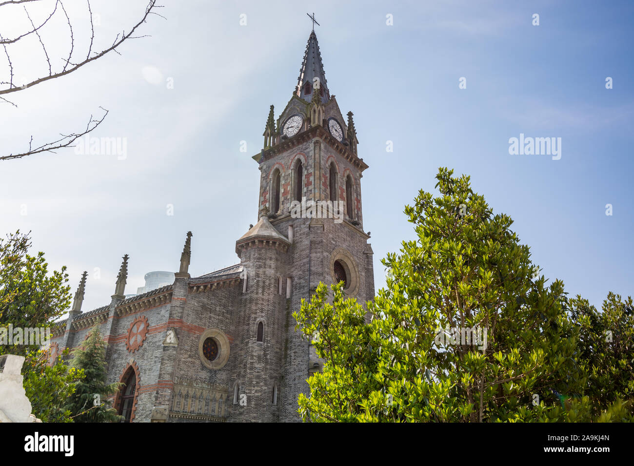 Main building and clock tower of Jiangbei Catholic Church, located at ...