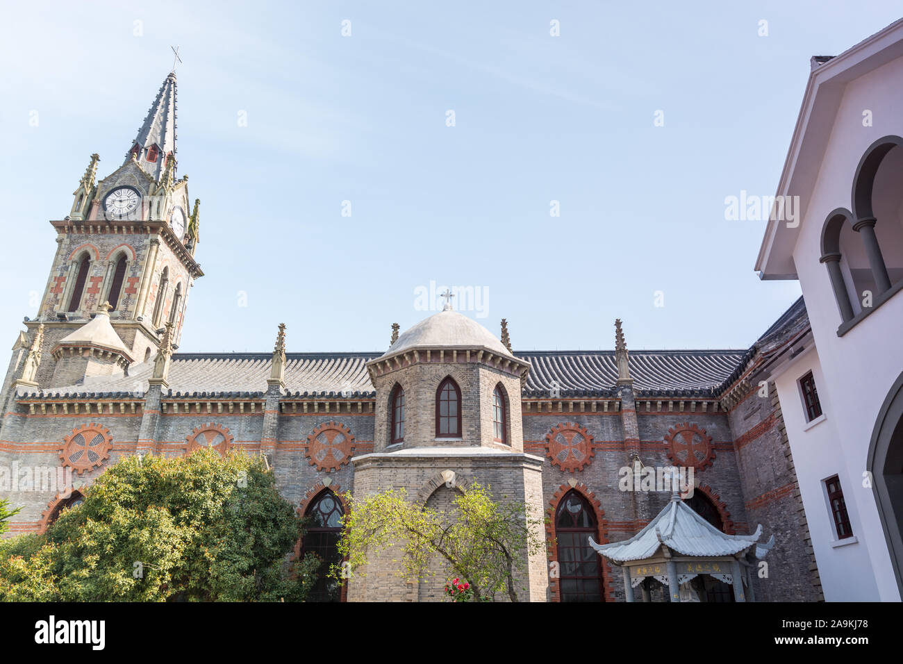 Main building and clock tower of Jiangbei Catholic Church, located at ...