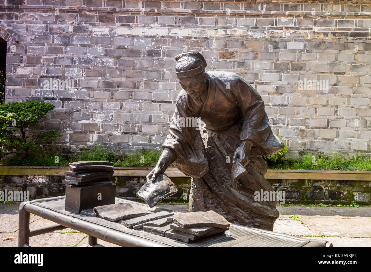 Statue of scholar in the Tianyige Library which is also called Building ...