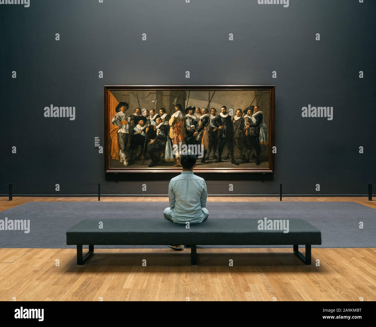 Amsterdam, Netherlands - July 20, 2019: Art lover admire the painting ...