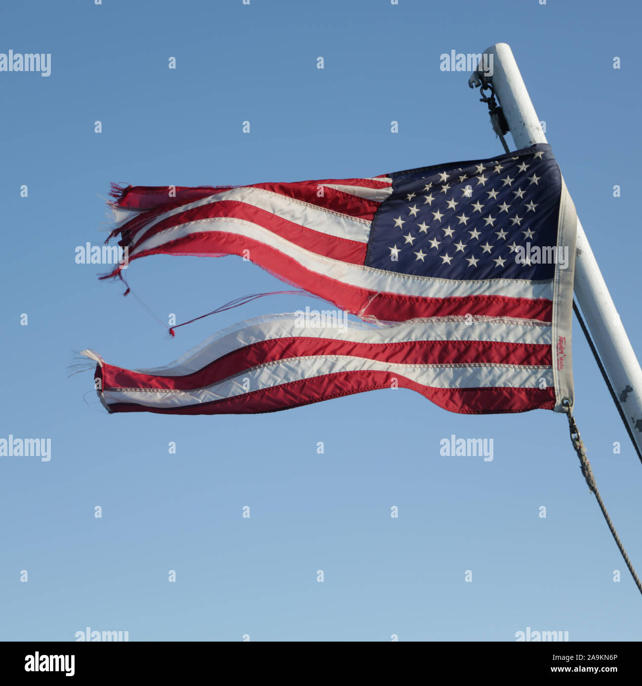 in USA the waving flag in the sky Stock Photo - Alamy