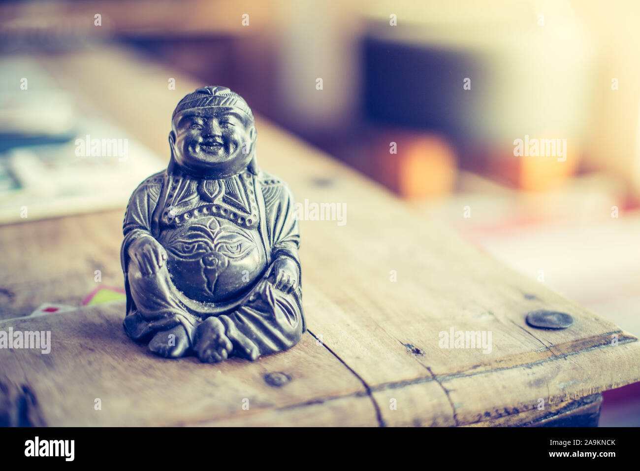 Feng shui: Buddha statue at on a table in the own living room Stock ...
