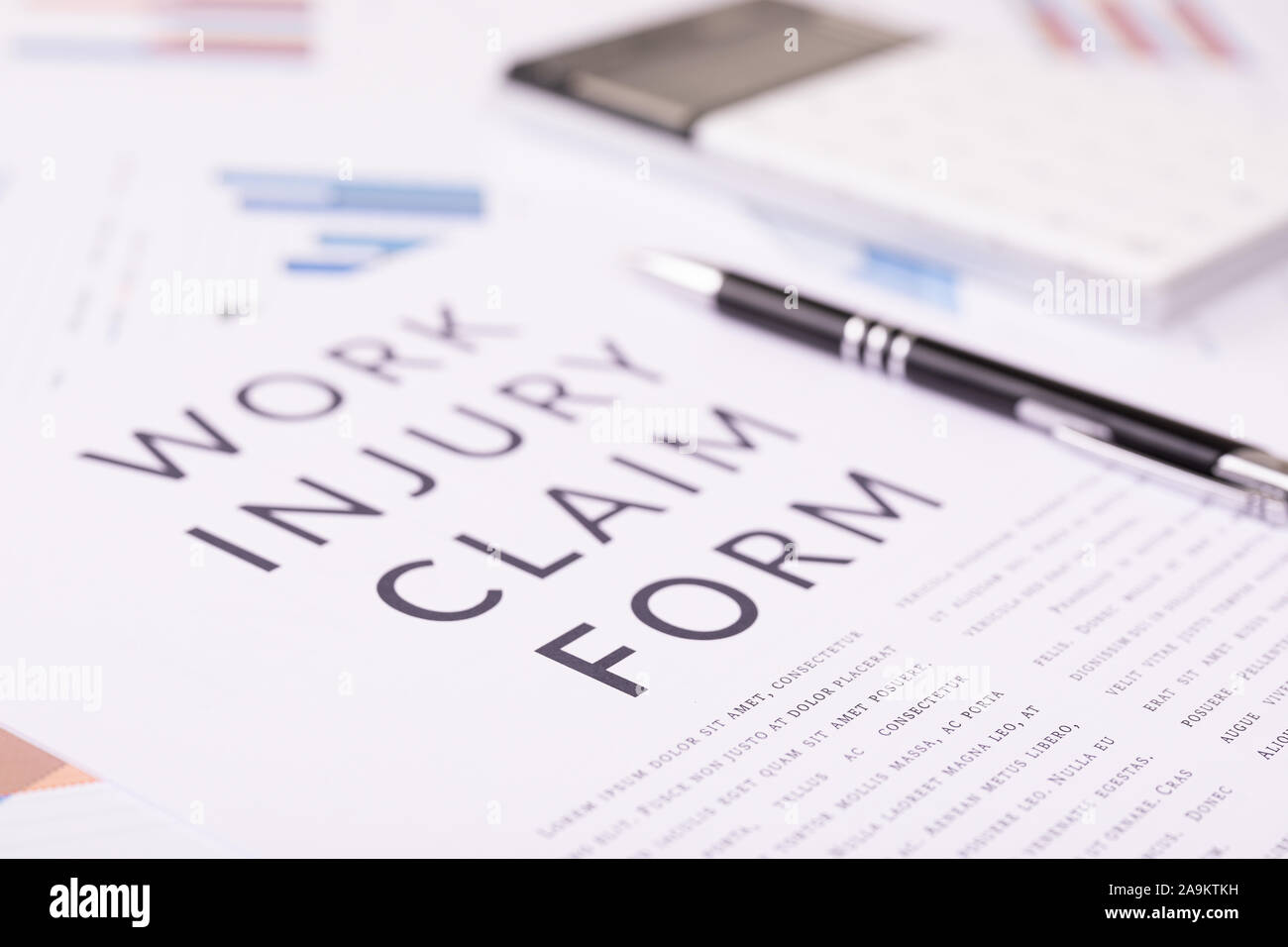 work injury claim form concept, documents on the desktop Stock Photo ...