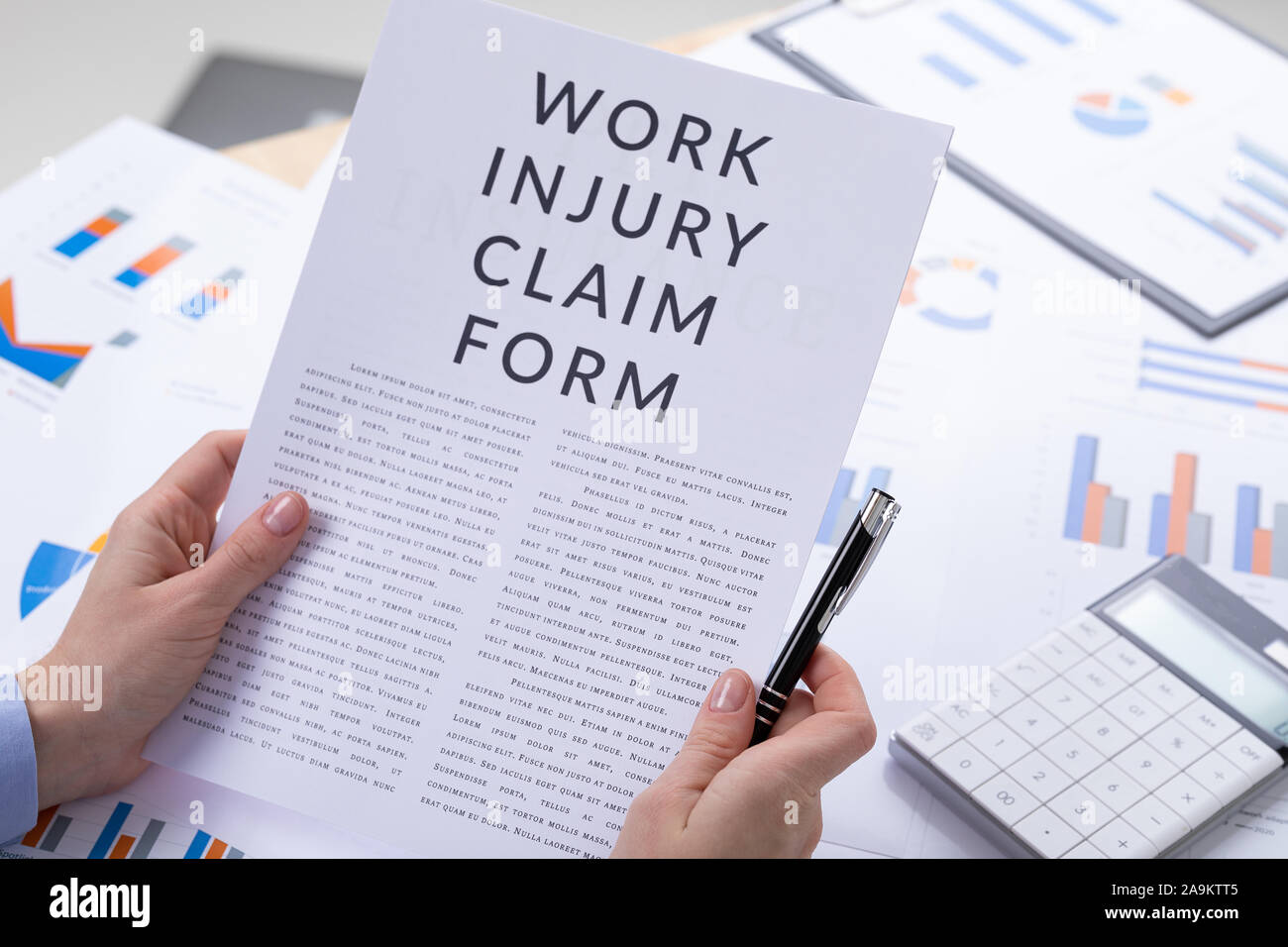 work injury claim form concept, documents on the desktop Stock Photo ...
