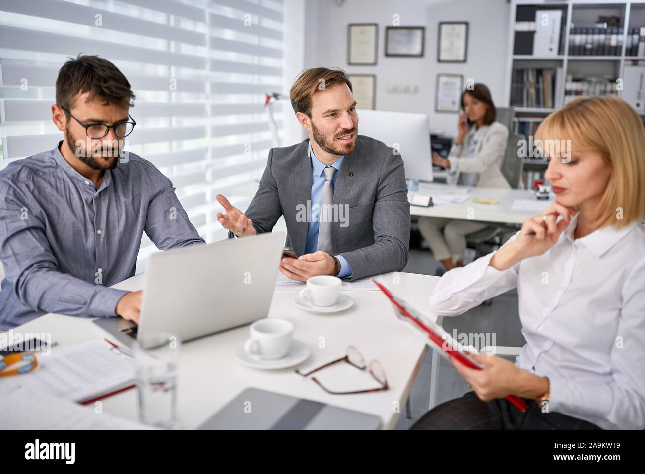 Successful business colleagues have meeting at work Stock Photo - Alamy
