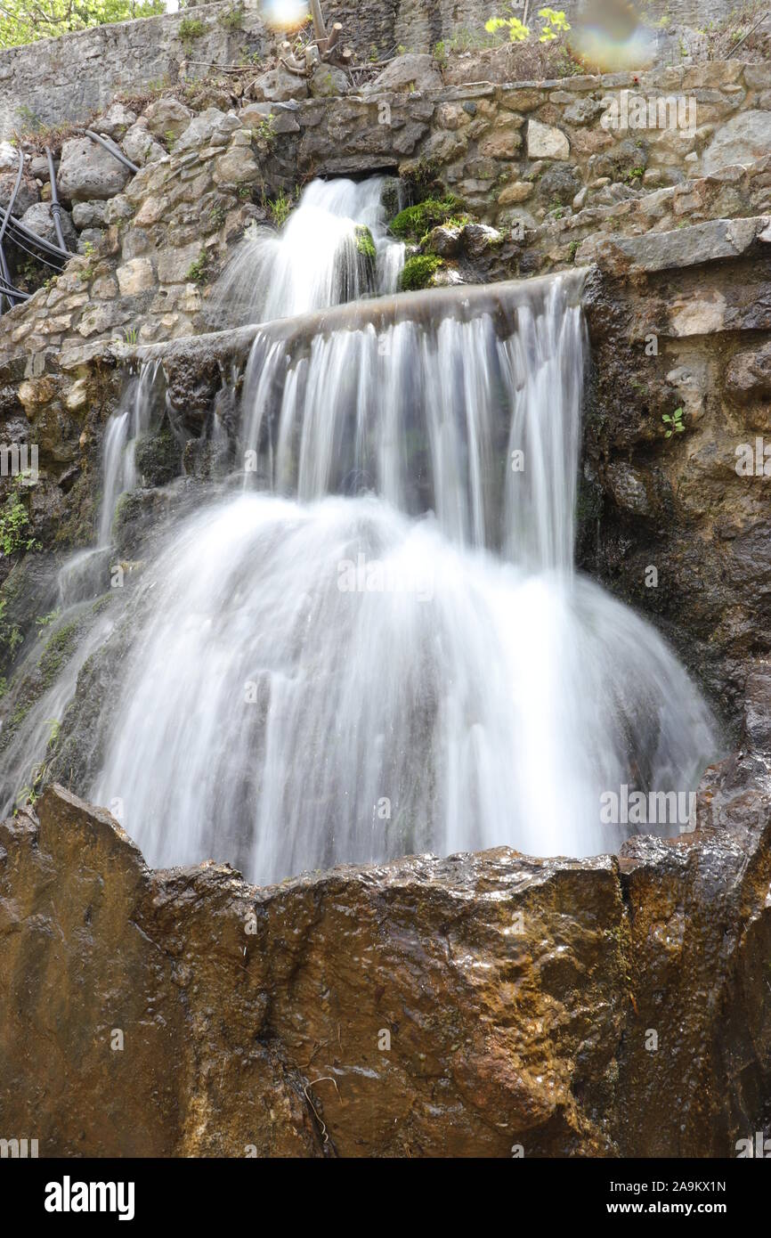 Argyropolis Waterfalls and Ancient Village of Lappa Stock Photo - Alamy