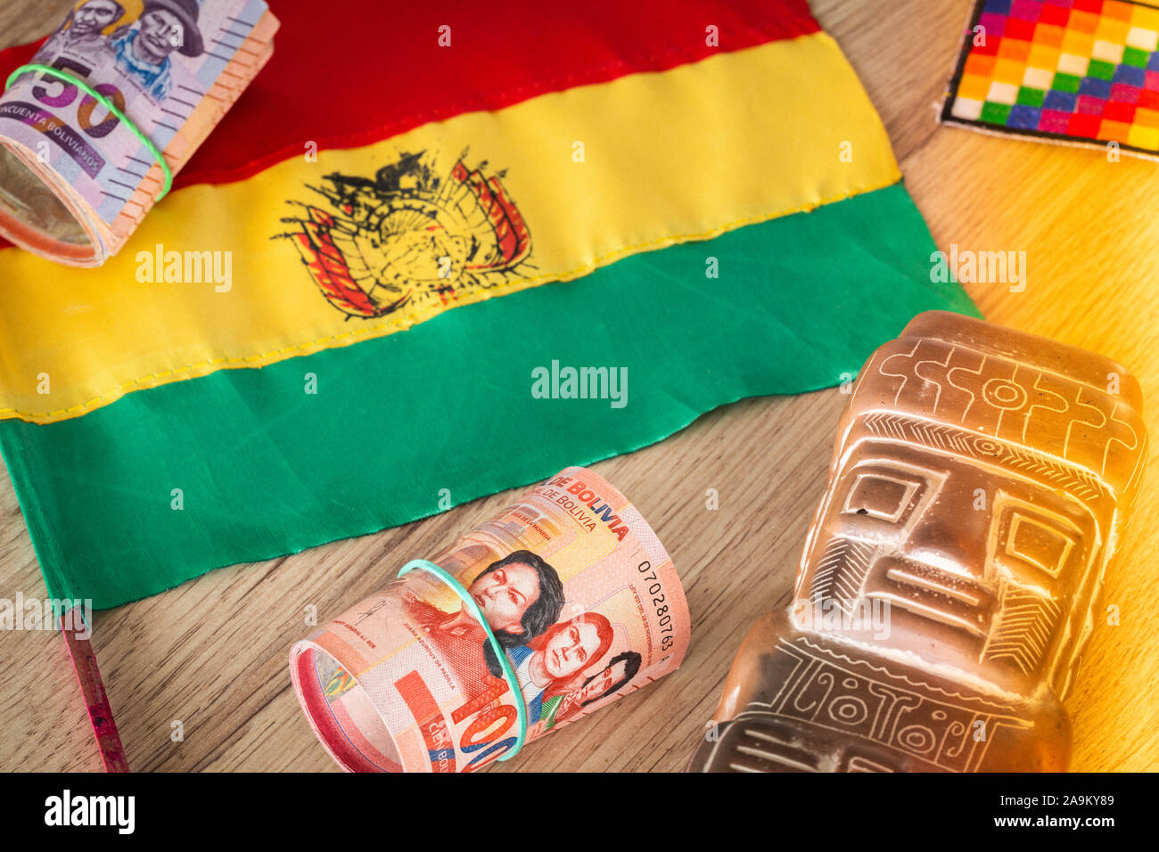 Bolivia. Country flag on the background of the old map and things ...