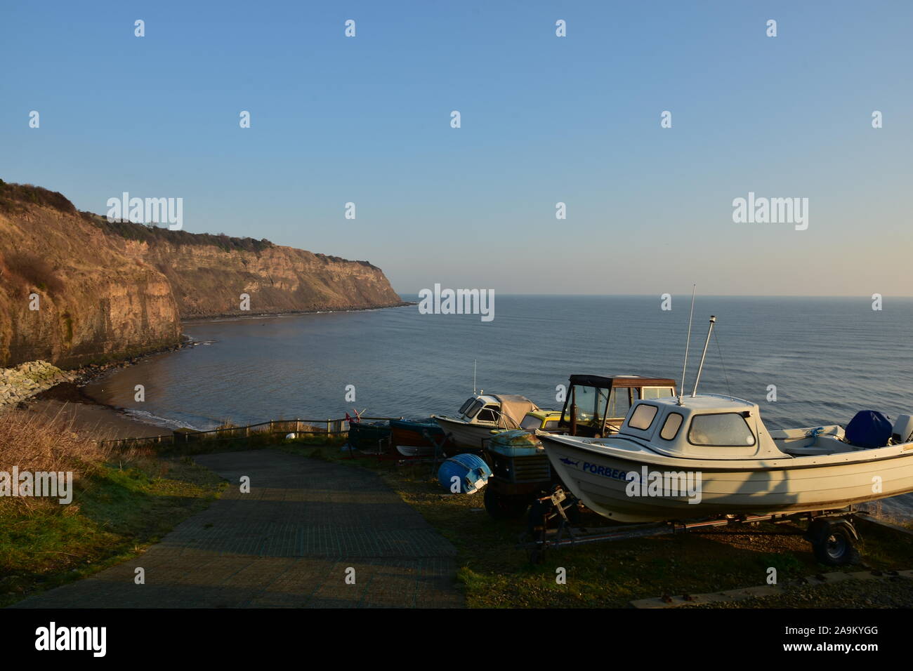 Boats beached at Robin Hood's Bay, North Yorkshire Stock Photo - Alamy
