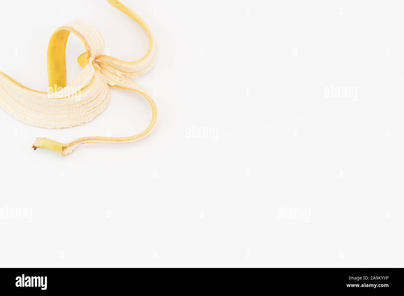 banana peel on a white background Stock Photo - Alamy