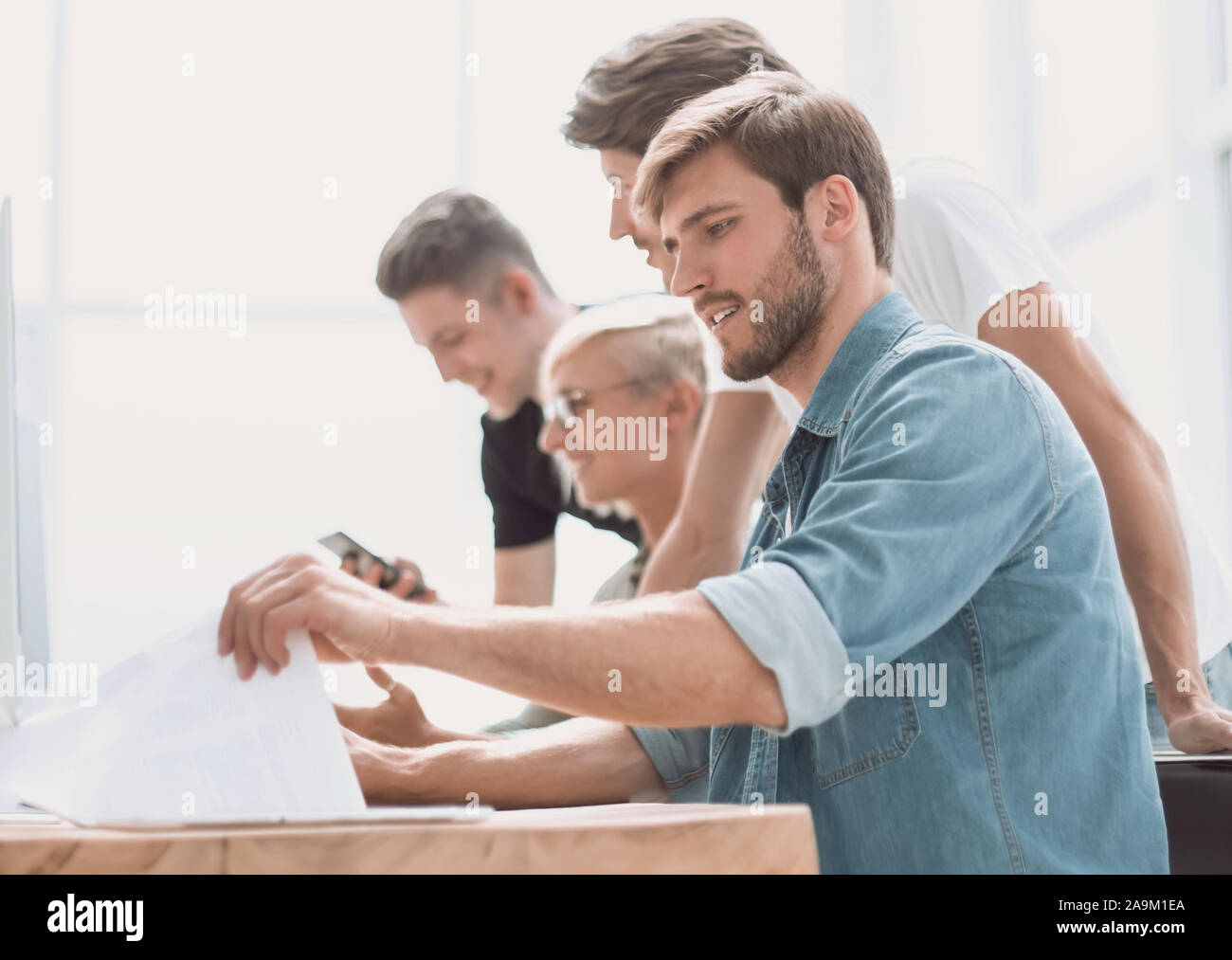 close up. a group of people working on computers Stock Photo - Alamy