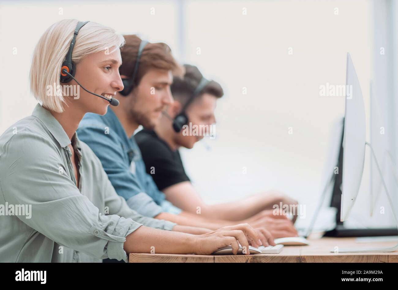 consultant call center talking to the client through the microphone ...