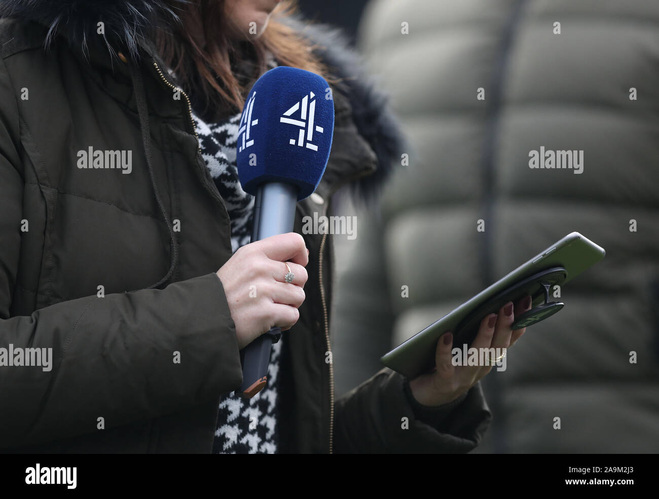 A presenter holds a Channel 4 branded microphone before the Pool Three ...