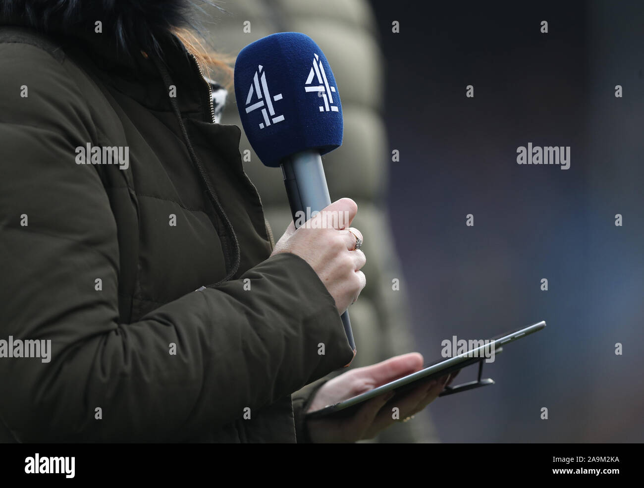A presenter holds a Channel 4 branded microphone before the Pool Three ...