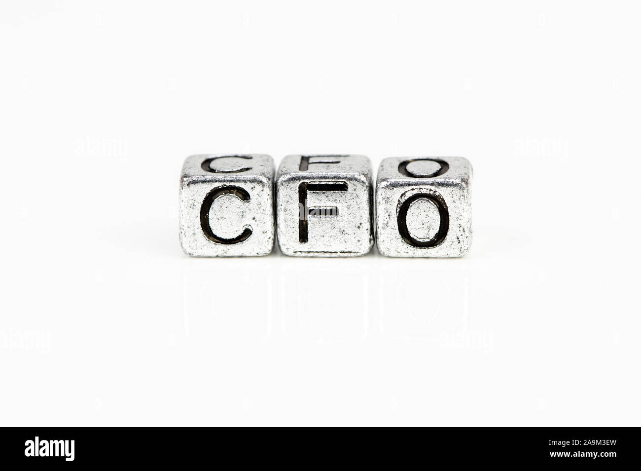 Chief Financial Officer CFO concept with cubic metal letters on white ...