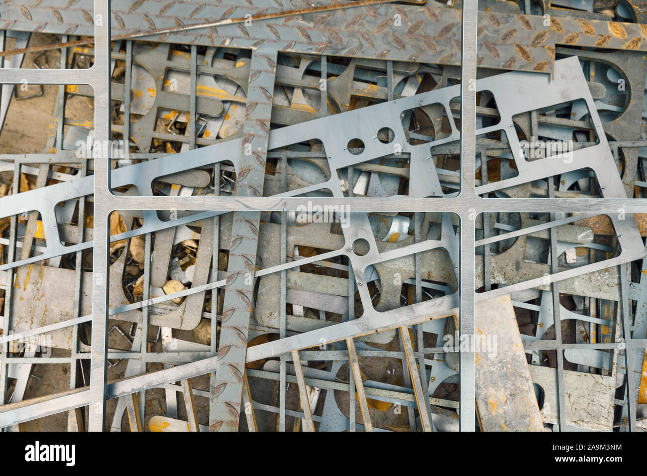 scrap metal on piles, abstract industry background Stock Photo - Alamy