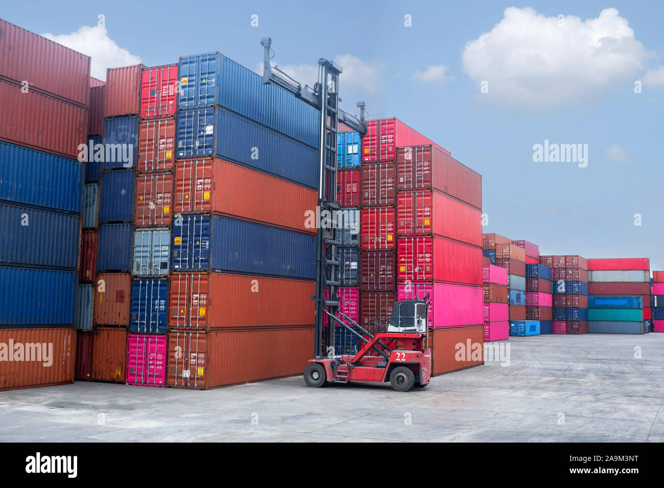 Container handlers In the harbor with storage cabinet background ...