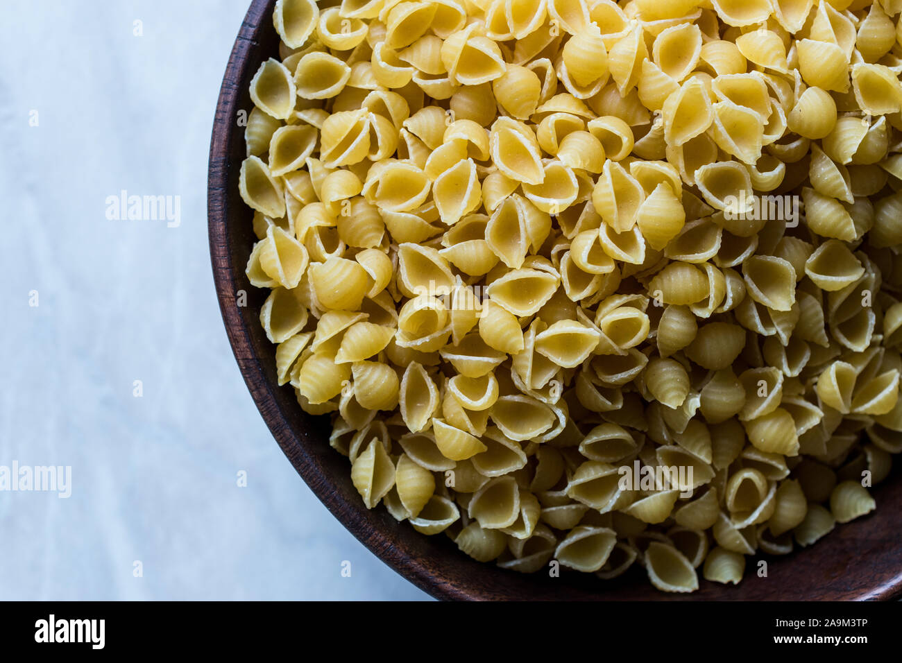 Italian Raw Pasta Shells Conchiglie / Conchiglioni in Wooden Bowl ...