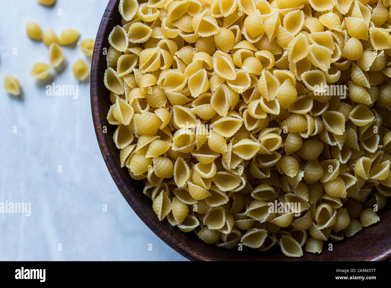Italian Raw Pasta Shells Conchiglie / Conchiglioni in Wooden Bowl ...