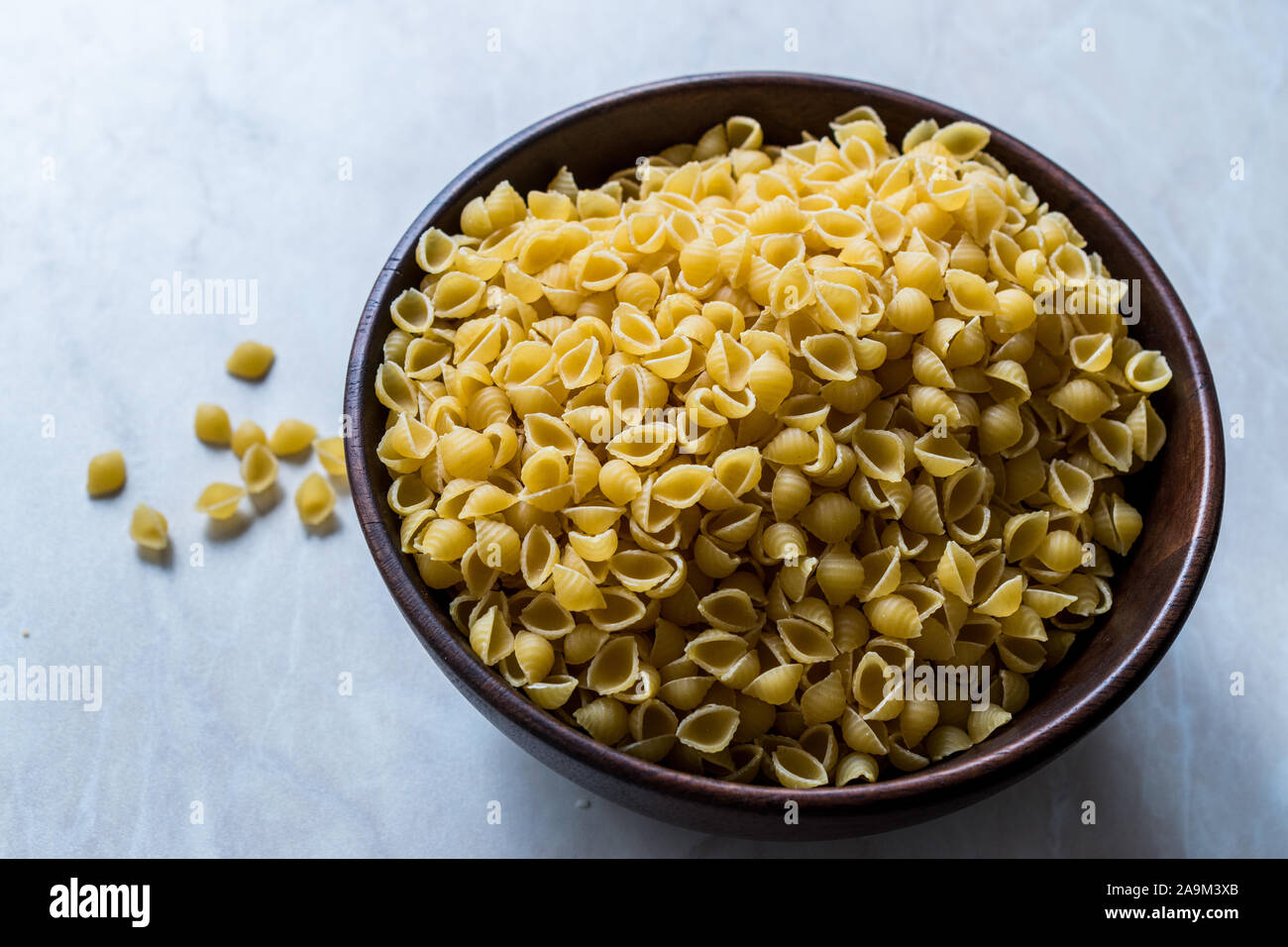 Italian Raw Pasta Shells Conchiglie / Conchiglioni in Wooden Bowl ...