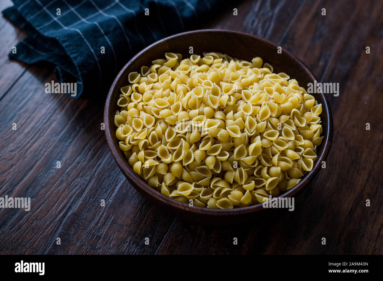 Italian Raw Pasta Shells Conchiglie / Conchiglioni in Wooden Bowl ...