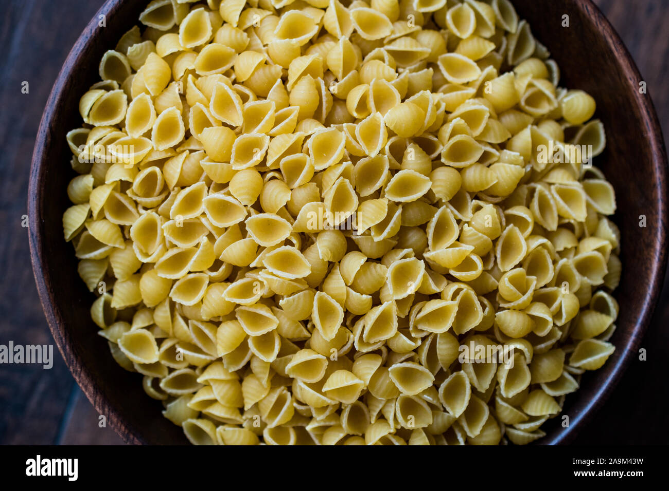 Italian Raw Pasta Shells Conchiglie / Conchiglioni in Wooden Bowl ...