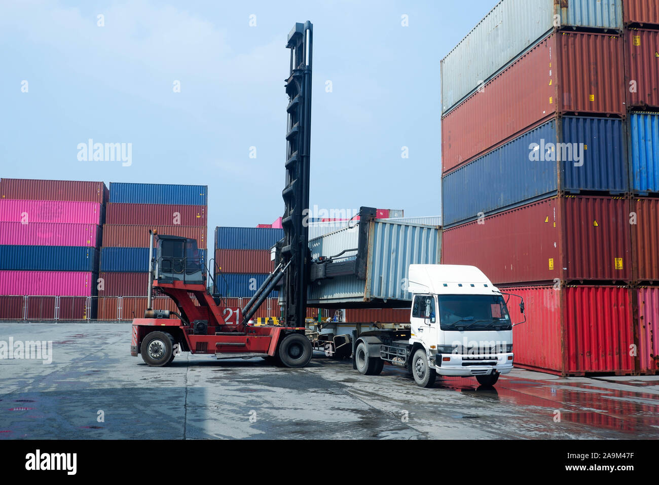Container handlers in the harbor Informational communication Stock ...
